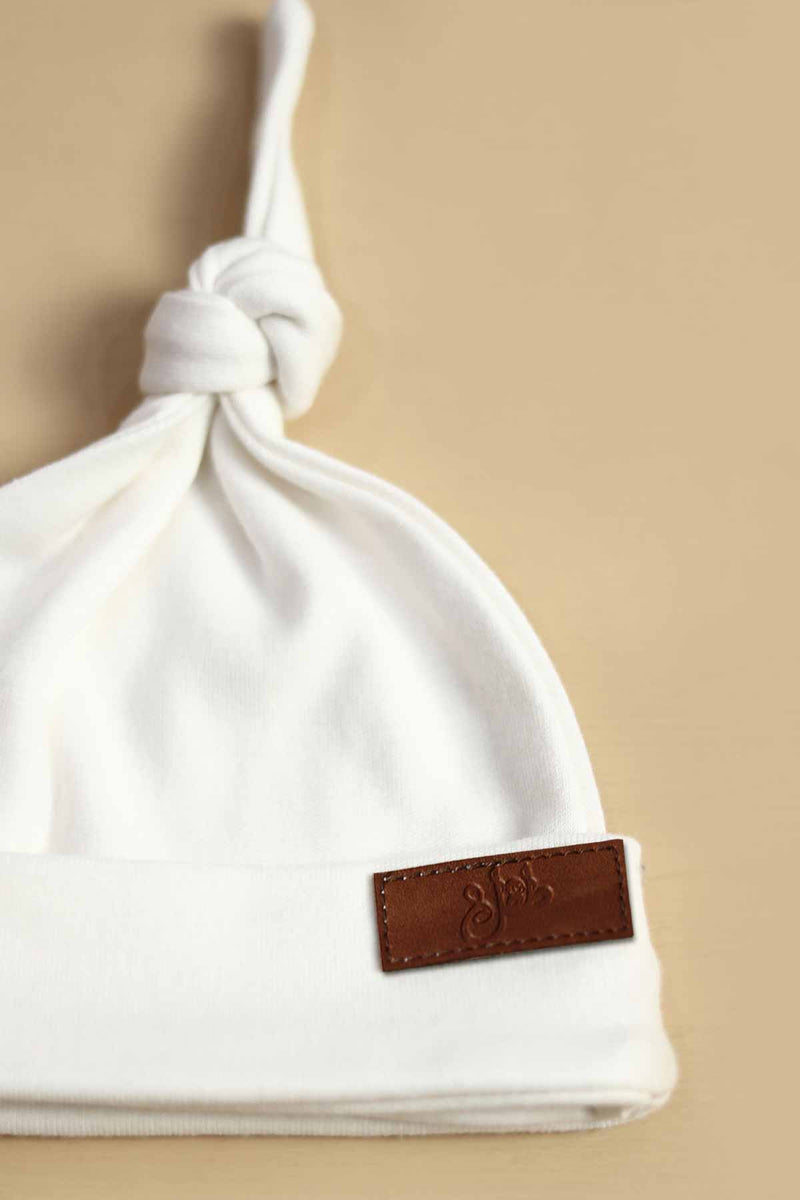 Solid White Knotted Baby Cap – Tifl